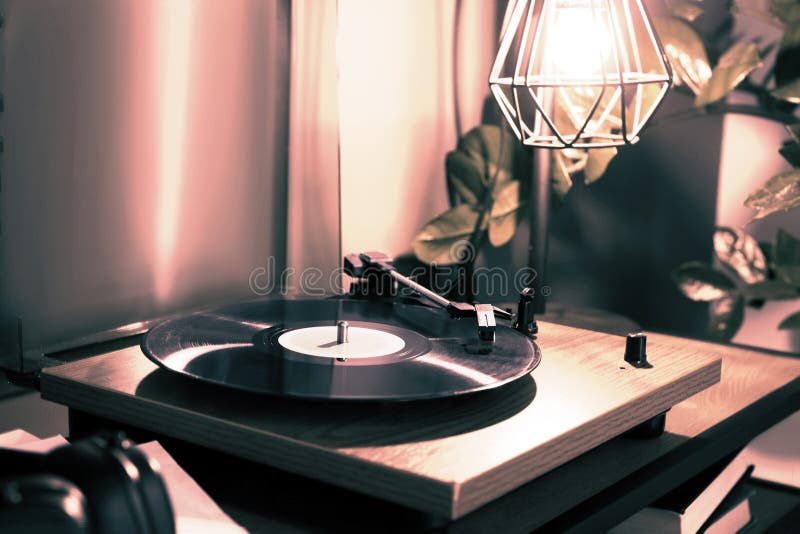 Stylish Turntable with Vinyl Record on Table Indoors. Black White ...