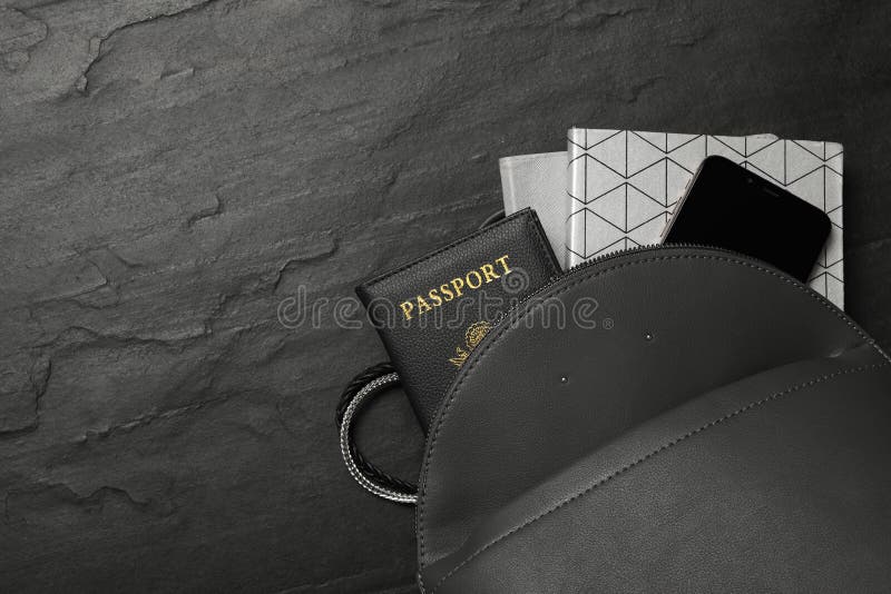 Stylish Urban Backpack with Different Items on Black Table, Flat Lay ...