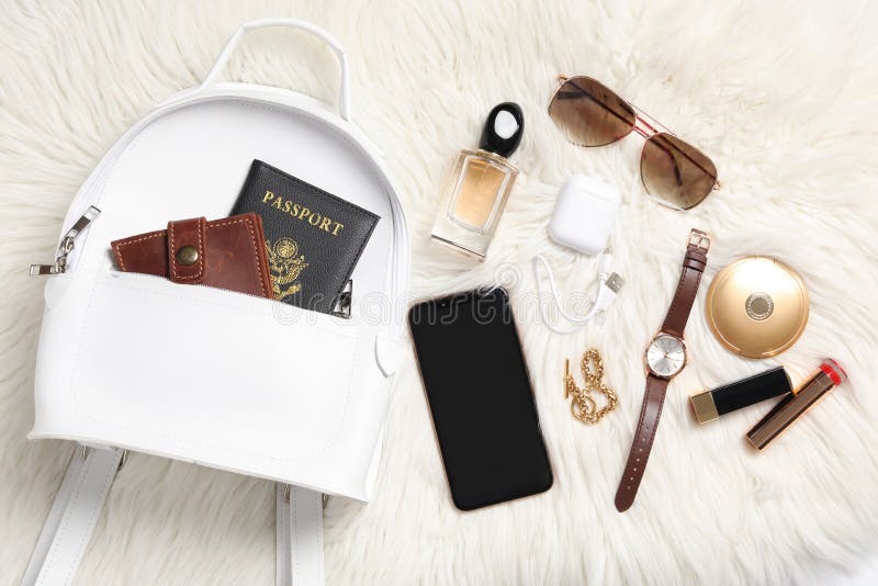 Stylish Urban Backpack and Different Items on White Faux Fur, Flat Lay ...
