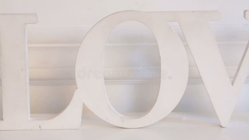 Stylish White Letters LOVE Stand on Floor in White Stock Video - Video ...
