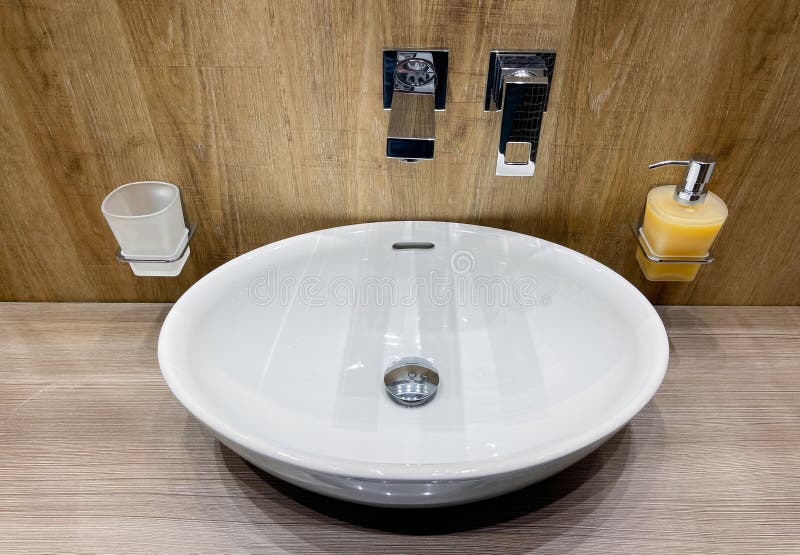 Stylish White Table Sink in a Modern Bathroom Wooden Interior Stock ...