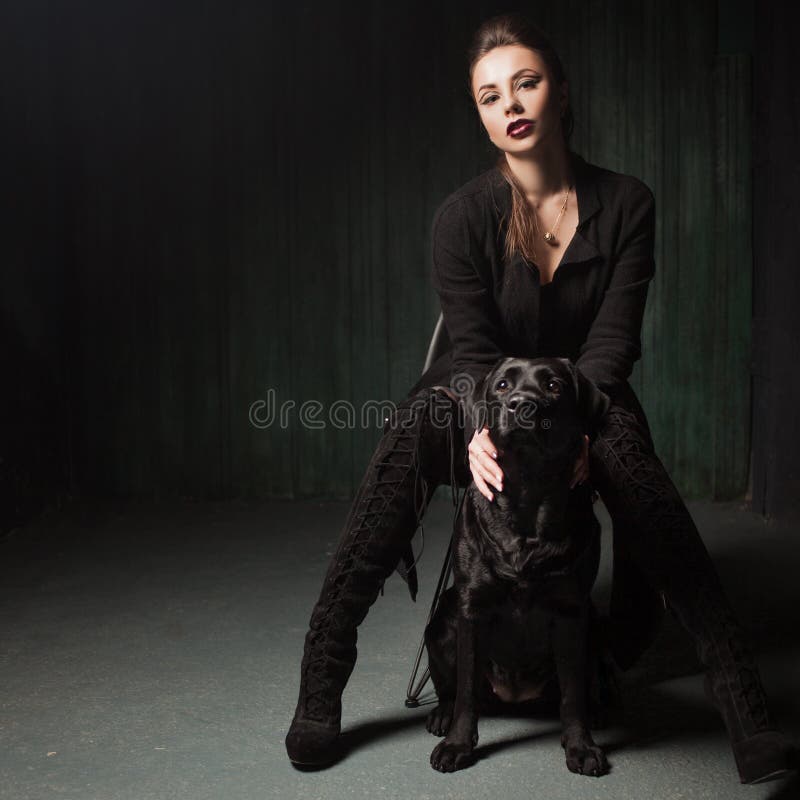 Stylish and Woman in Black with Black Labrador. Stock Photo - Image of ...