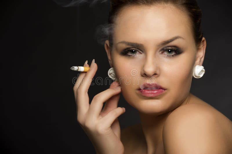 Stylish Woman Smoking a Cigarette Stock Image - Image of cigarette ...