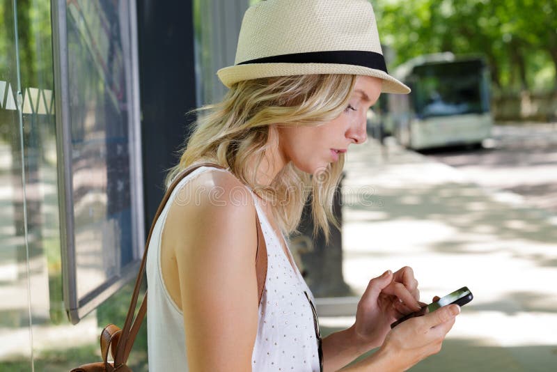 Stylish Woman Using Phone while Waiting Stock Image - Image of street ...