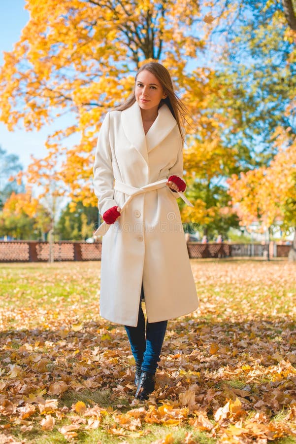 Stylish Woman Walking Through An Autumn Park Stock Image Image Of