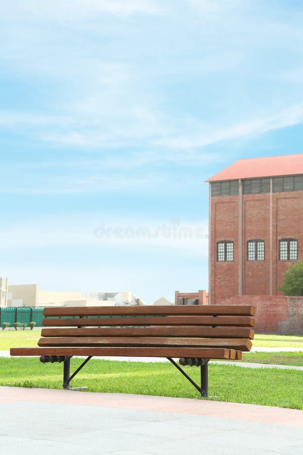 Stylish Wooden Bench in Park on Sunny Day Stock Image - Image of green ...
