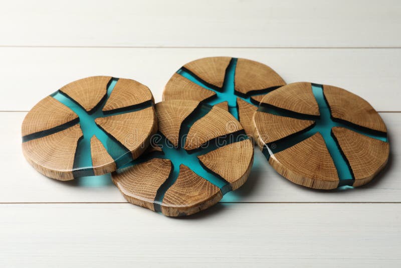 Stylish Wooden Cup Coasters on White Table Stock Image - Image of ...