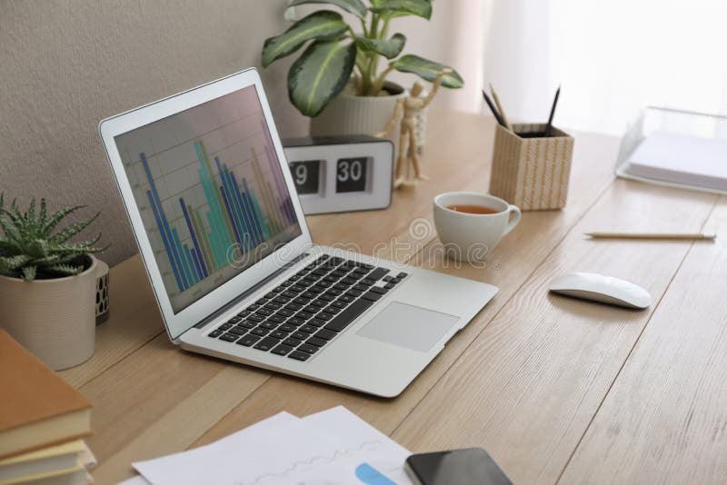 Stylish Workplace with Laptop on Wooden Desk. Interior Design Stock ...