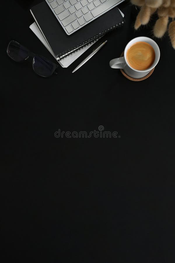 Stylish Workspace with Cup of Coffee, Notebook and Computer Keyboard on ...