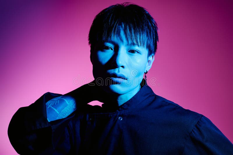 Stylish Young Asian Man Poses Confidently Stock Photo - Image of ...