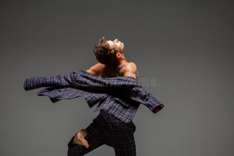 Stylish Young Guy Dancer in Suit Dancing Modern Expressive Dance in ...