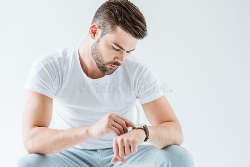 Stylish Man Checking Time on Watch Stock Image - Image of pose, watch ...