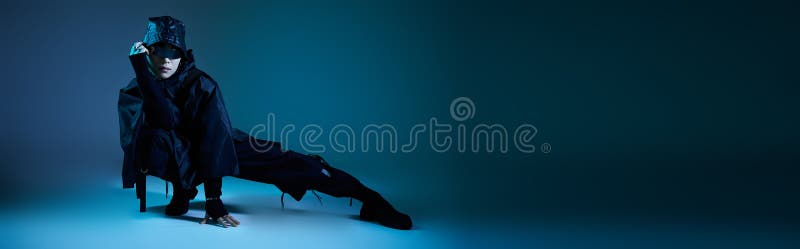 Stylish Young Man Poses Dramatically on Stock Image - Image of lighting ...