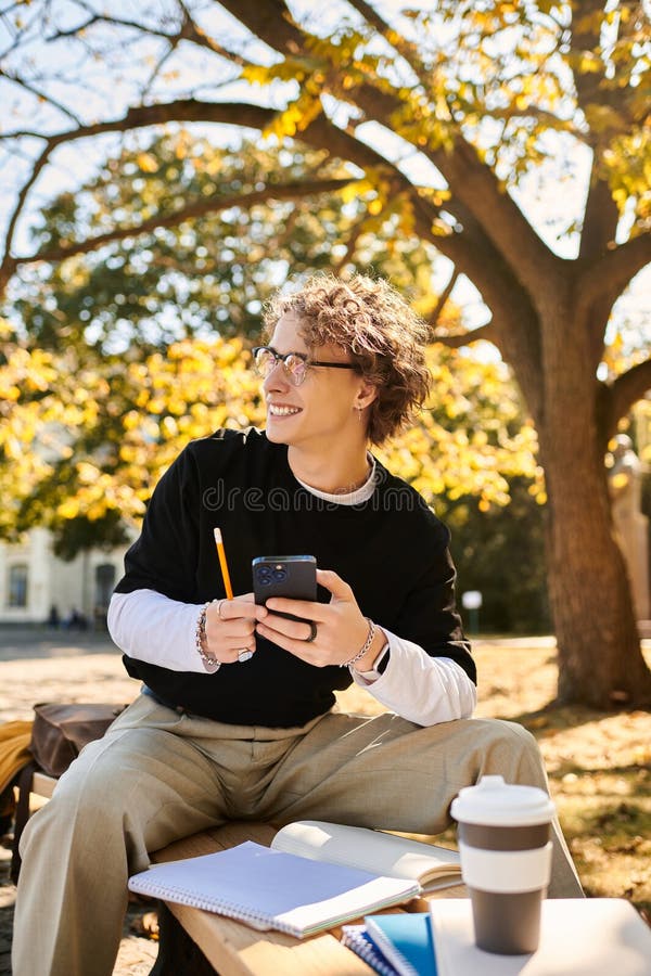 Stylish Young Man Studying Outdoors Under Stock Photo - Image of casual ...