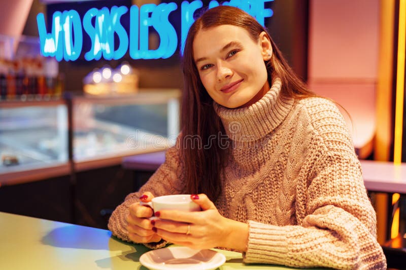 Stylish Young Woman Drinking Coffee at the Coffee Shop Stock Image ...