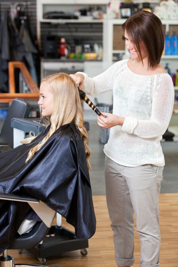 Stylist Curling Womans Hair Stock Photo - Image of curling, parlor ...