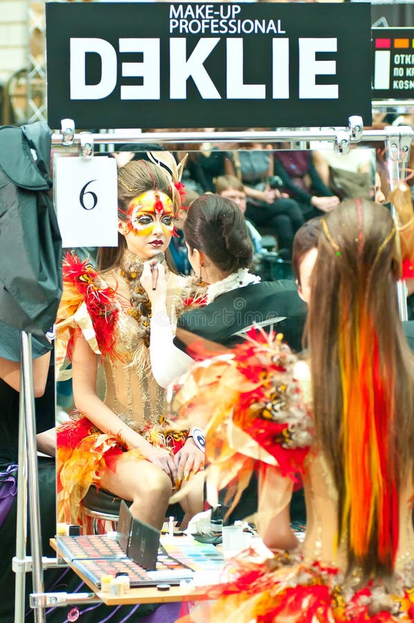 Stylist and Model on Show for Creative Makeup Editorial Photo - Image ...