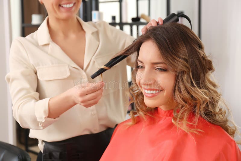 Stylist Working with Client in Salon Stock Photo - Image of hand ...