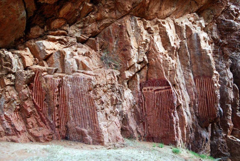 Stylized Aboriginal Paintings on the Pock Face Stock Photo - Image of ...