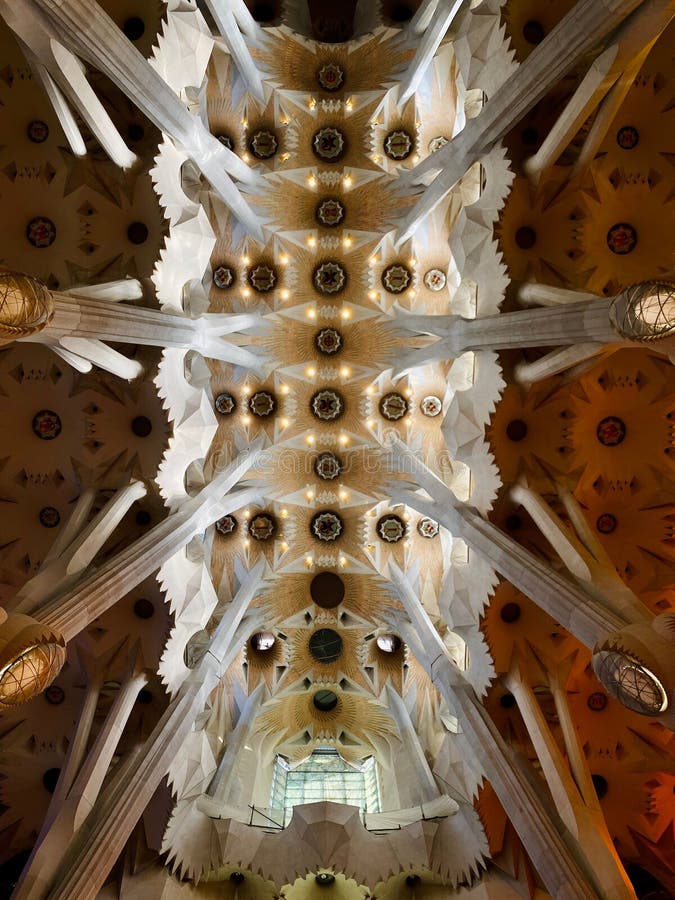 Stylized Cathedral Ceiling Featuring a Tall, Column and a Round Window ...