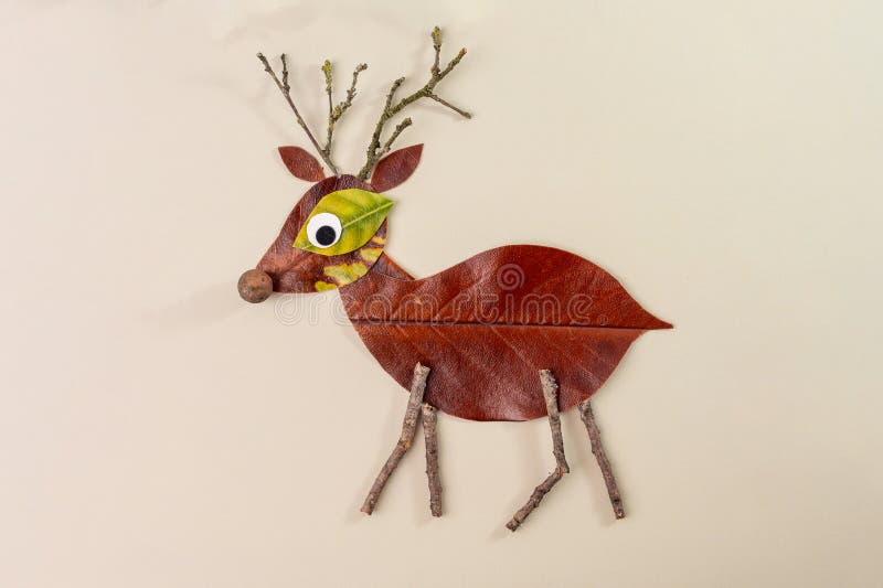 Stylized Deer Made from Natural Materials in Flat Lay on Light Grey ...