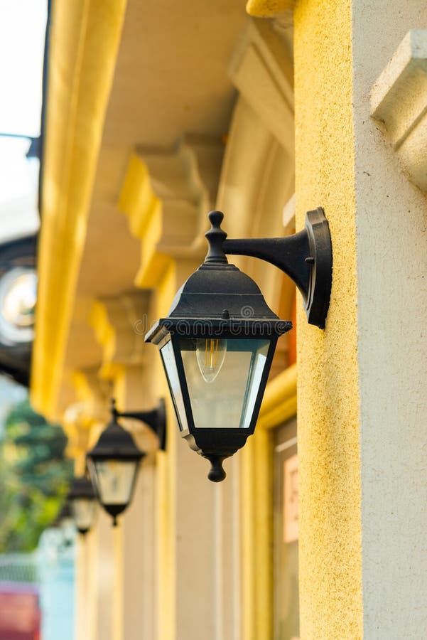 Front Street Lamp on the Wall Stock Image - Image of landmark, electric ...