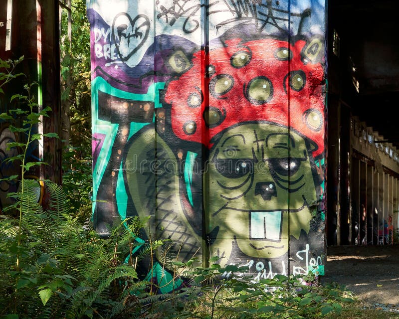 A Stylized Graffiti Beaver with a Red Hat on the Outside Wall of an Old ...