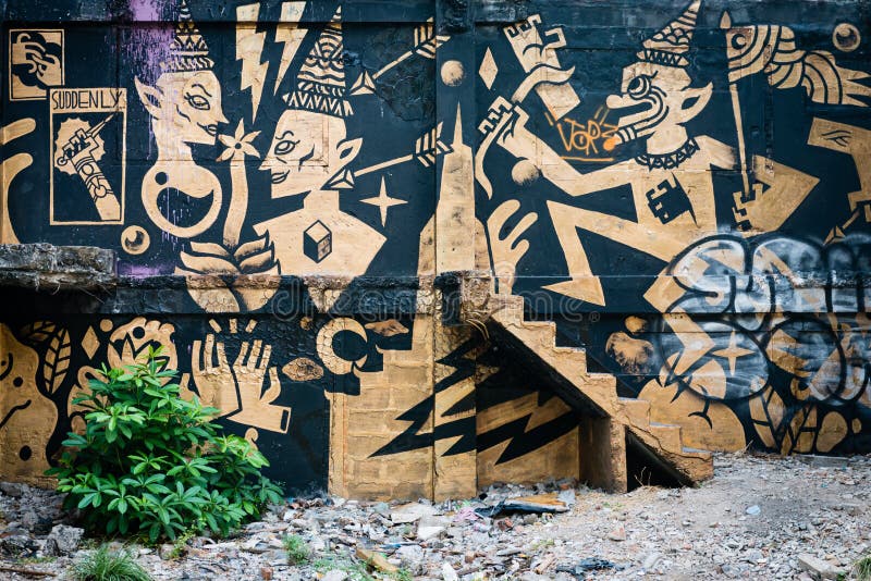 Stylized Mural by and Unknown Artist, Marred by Graffiti Editorial ...