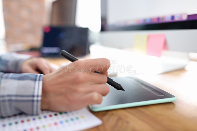 Stylus in Hand from Graphics Tablet Closeup Stock Photo - Image of desk ...