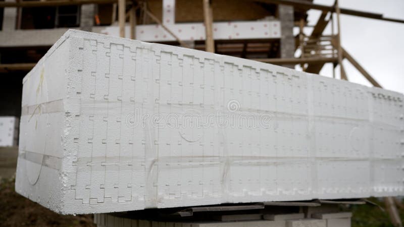 Construction Worker Installing Styrofoam Insulation Sheets on House ...