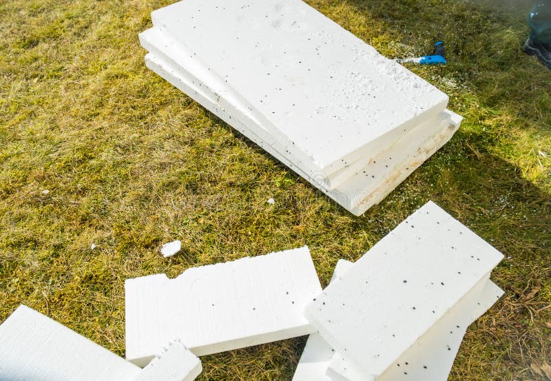Styrofoam Sheets of Various Shapes on the Grass. Pieces of White ...