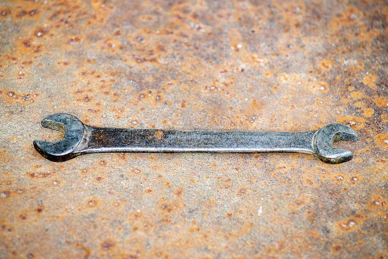 Rusty Wrench on Rust Background. Subject Shot. Front and Top View Stock ...