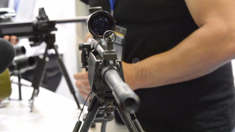 Submachine Gun on the Table Stock Video - Video of crowd, annual: 129397487