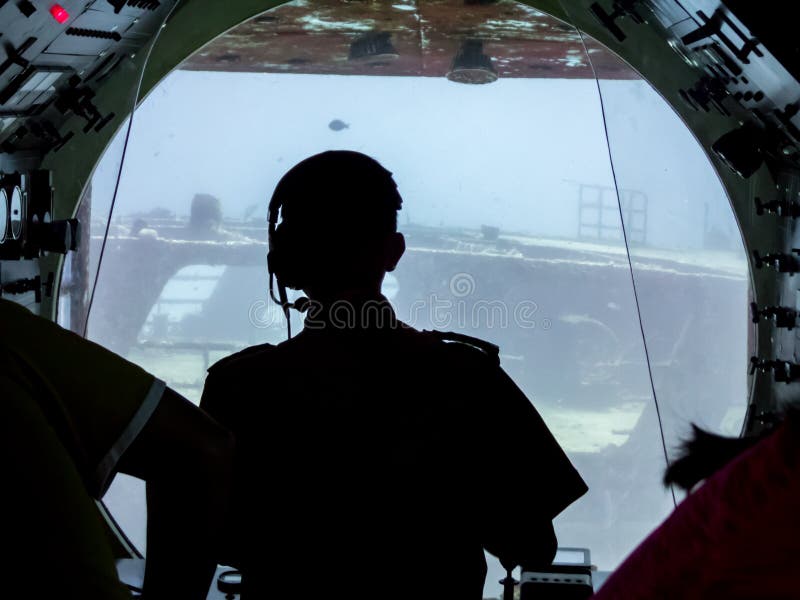 Submarine Pilot Exploring an Underwater Shipwreck Stock Image - Image ...