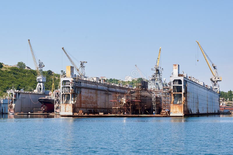 Submarine ship in dry dock stock image. Image of pier - 34120045