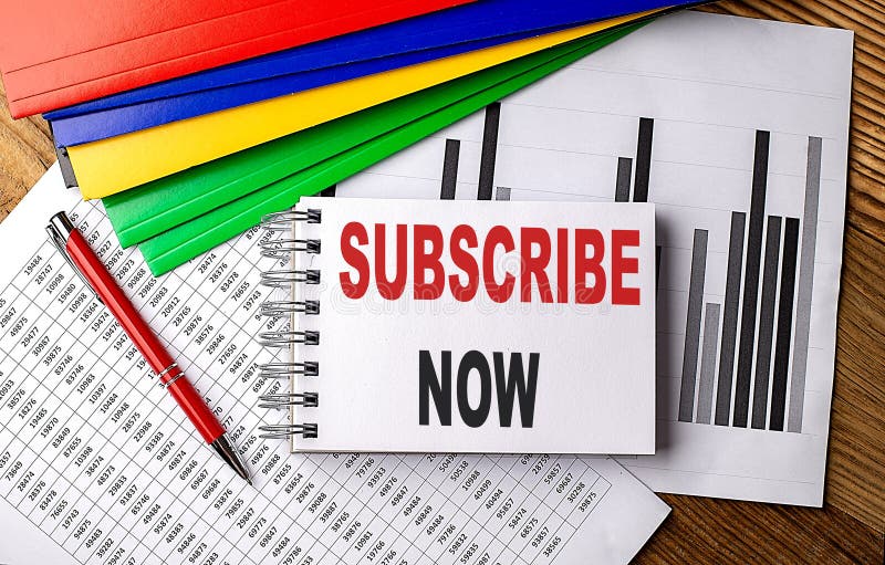 SUBSCRIBE NOW Text on a Notebook with Pen, Folder on a Chart Background ...