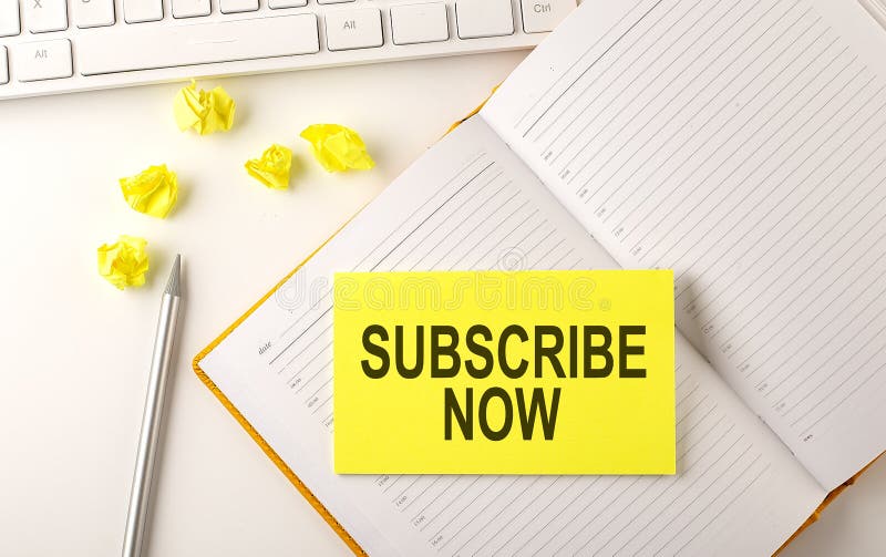 SUBSCRIBE NOW Text on Sticker on Diary with Keyboard and Pencil Stock ...