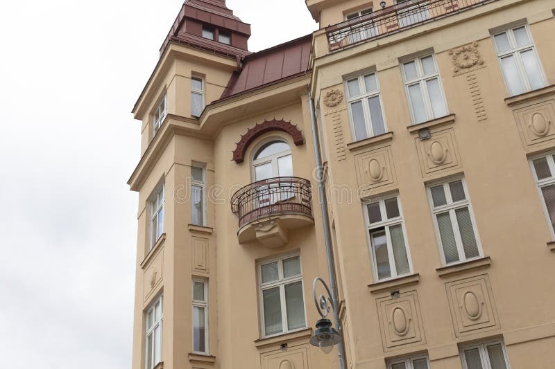 A Substantial Structure Featuring a Balcony Attached To One Side Stock ...