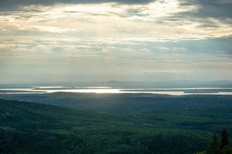 Subtle Sun Rays Fall Across Acadia National Park Stock Image - Image of ...