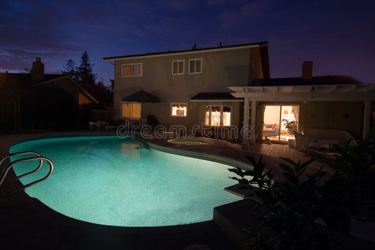 Suburban Backyard Pool in the Evening Stock Image - Image of ...