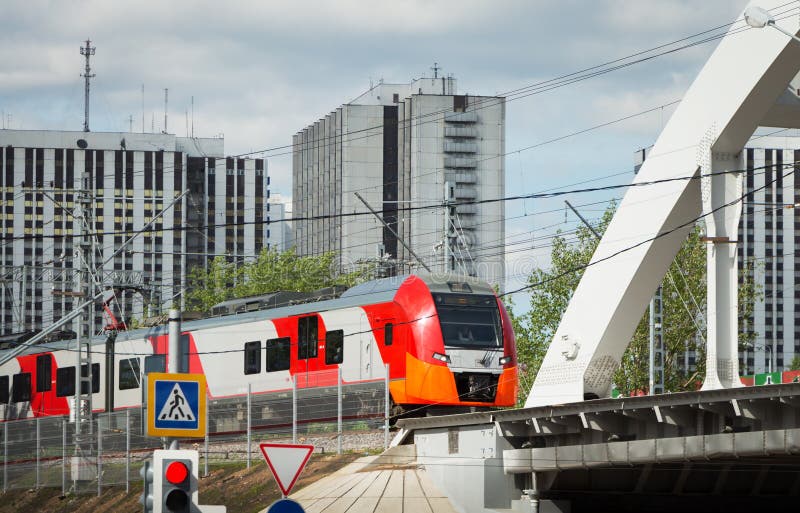Suburban electric train stock image. Image of building - 94446427