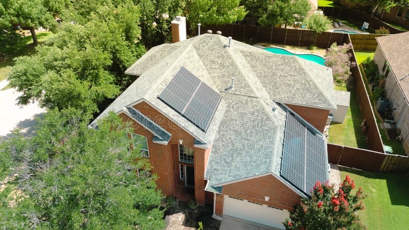Suburban Homes with Rooftop Solar Panel Arrays, Angled Installations ...