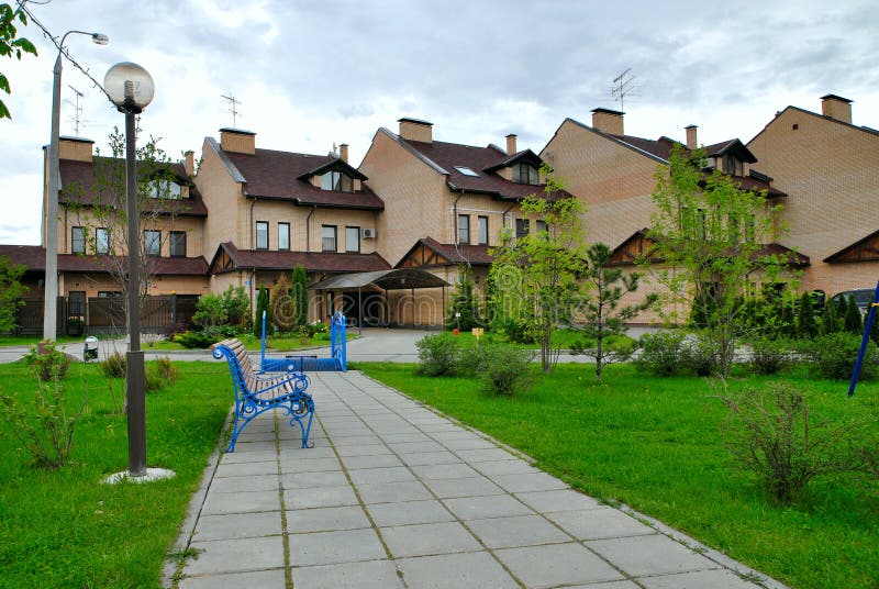 Suburban townhouses. stock image. Image of nature, meadow - 27558033
