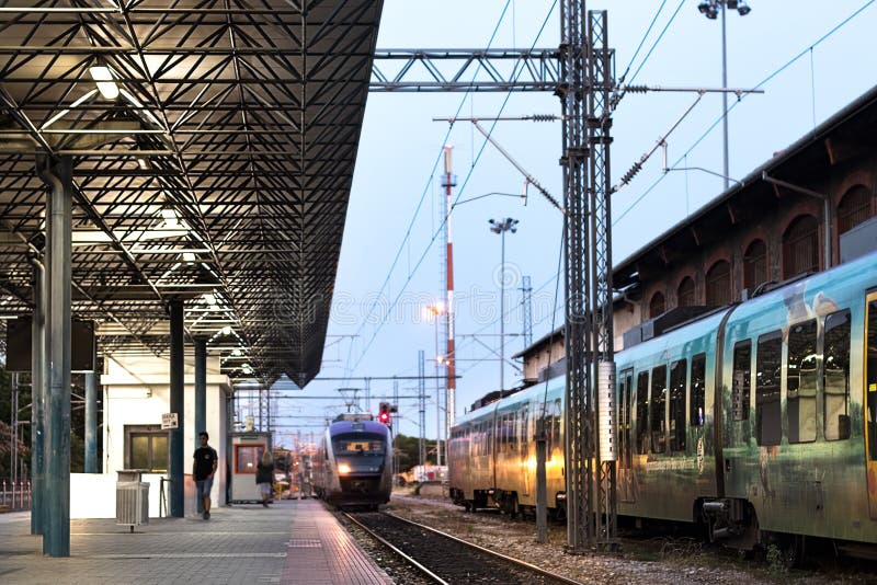 Train approaching station stock photo. Image of mover - 1527252