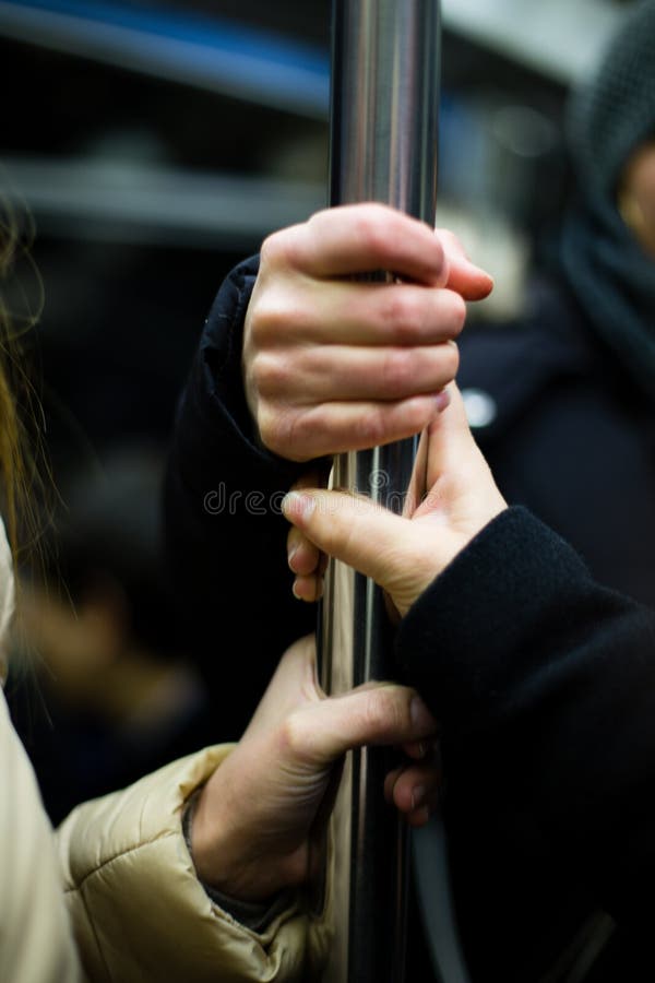 Subway hands passenger stock image. Image of common, sharing - 84361977