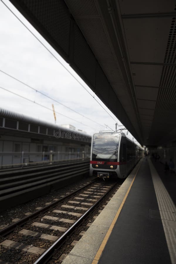 Subway Station Outdoors with Train Approaching Its Stop Stock Image ...