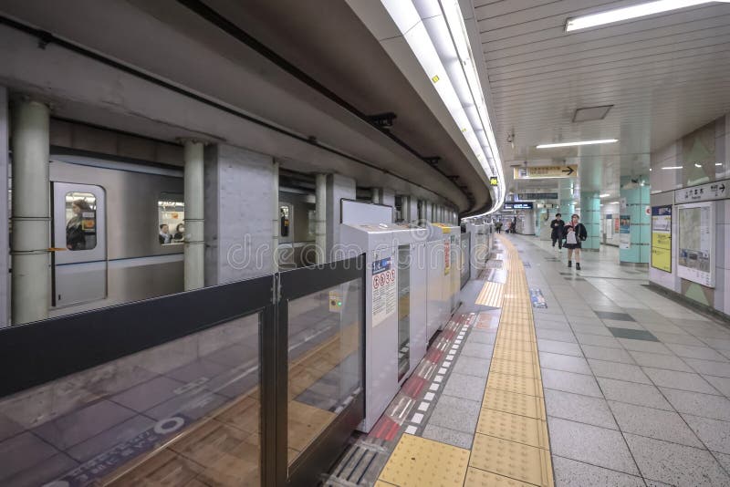 Subway Station with Train and Platform Barriers Tokyo Dec 5 2024 ...