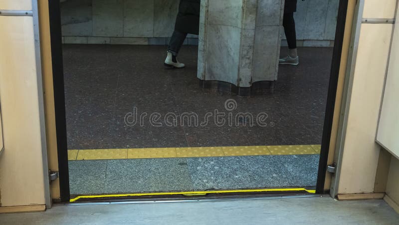 Subway Train with Opened Doors on Platform. Metal Doors on the Train ...