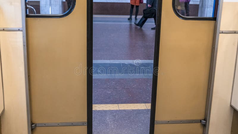 Subway Train with Opened Doors on Platform. Metal Doors on the Train ...