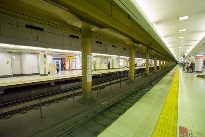 Subway Train Station Platform with Commuters in Tokyo Japan Editorial ...